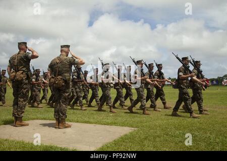 Lt. Col. Michael T. Hlad passes the noncommissioned officer sword of ...