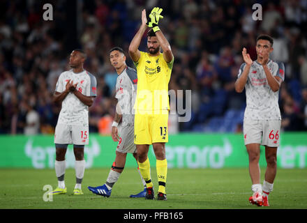Alisson Becker of Liverpool applauds the fans after the final whistle ...