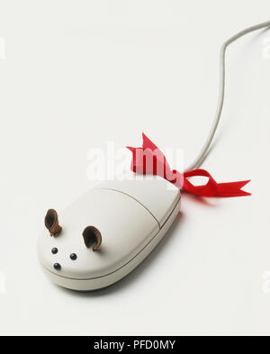 Computer mouse with gifts on white background. Internet shopping ...