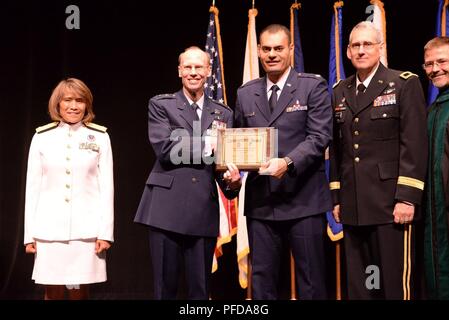 Air Force Maj. Gen. Bart O. Iddins (left), 59th Medical Wing commander ...