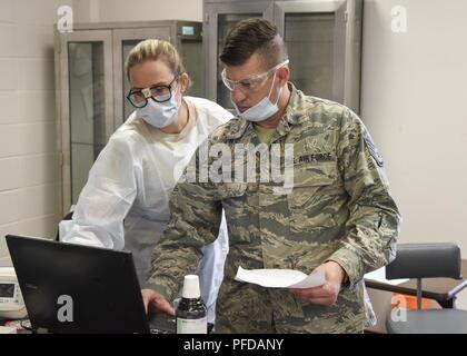 U.S. Air Force Maj. Amanda Altman, right, 422d Communications Squadron ...