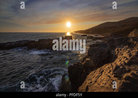 Colorful coastal view of Leo Carrillo State Beach at sunset from Sequit ...