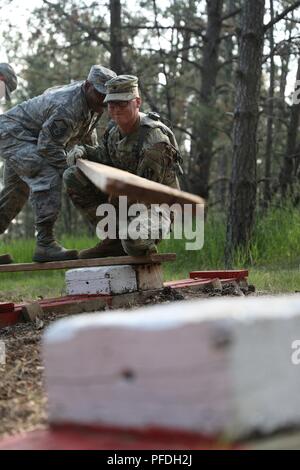 U.S. Army Sgt. Nathan Ploeg, assigned to the 982nd Combat Camera ...