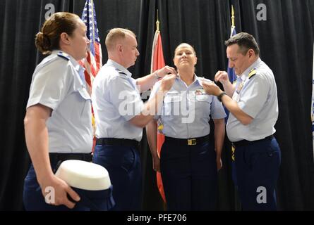 Chief Petty Officer Elizabeth Meister poses with fellow crewmembers ...