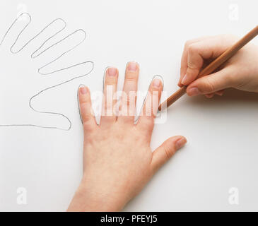 Hand of child drawing with pencil Stock Photo - Alamy
