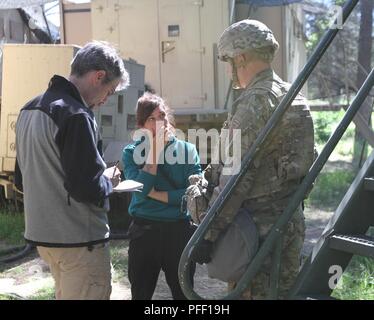 Brig. Gen Eric Strong speaks to the attendees and family members during ...