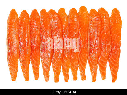 Raw salmon fillet with vibrant orange flesh dark skin on rustic wooden ...