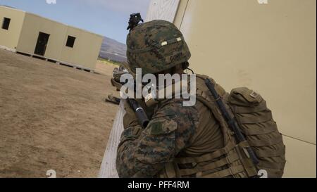 U.S. Marine 1st Lt. Alex Tassone, third platoon commander, issues ...