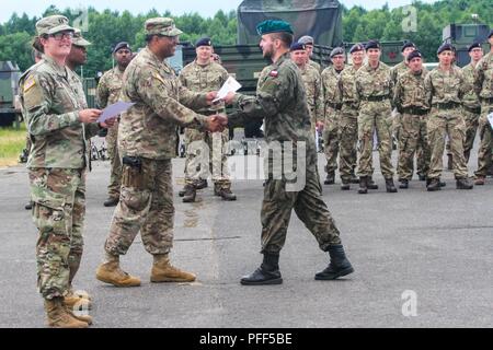 U.S. Army Col. Jordan V. Henderson III (right), 30th Medical Brigade ...