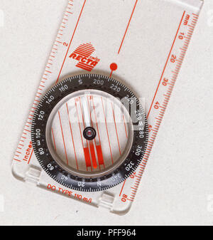Above view of a magnetic compass the needle always points north and ...