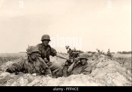 German soldiers of the Waffen SS, taken prisoner in Normandy, 1944. The ...