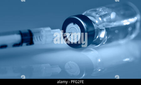Tuberculin Syringe and Sterile Vial Filled with Medication Solution. An ...