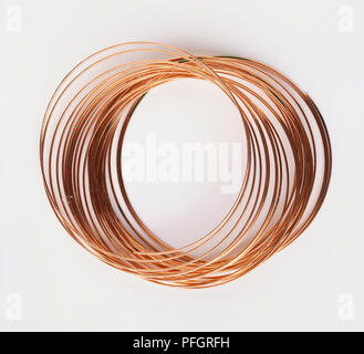 Copper wire coil Stock Photo - Alamy