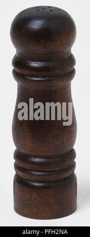 Salt and Pepper shaker on a wooden table Stock Photo - Alamy
