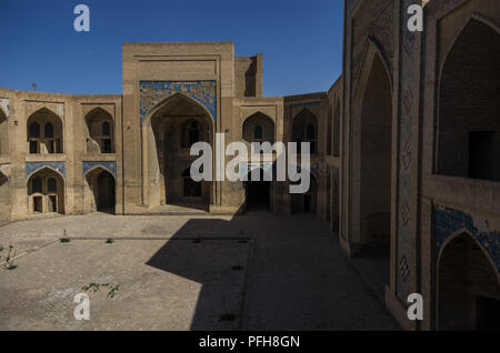 Courtyard of Abdullah-khan madrasah in Kosh-Madrasah complex. Bukhara ...