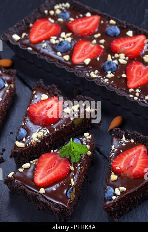 A vertical closeup of a cake with chopped almonds Stock Photo - Alamy