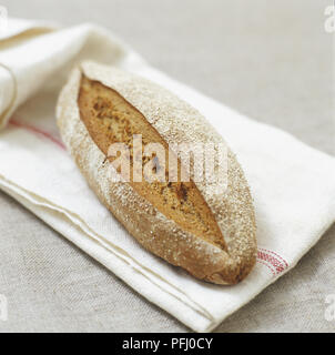 Rye bread with flour on table close up Stock Photo - Alamy