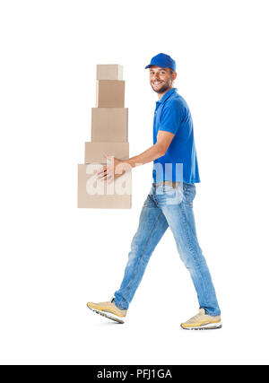 Full length portrait of a postman walking at a pedestrian crossing and ...