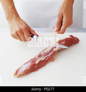 Raw pork meat tenderloin fillet for preparation Stock Photo - Alamy