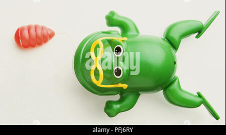 A close-up of a green frog (white-lipped tree frog) underwater in ...