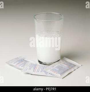 A tall clear glass filled with a refreshing beverage Stock Photo - Alamy