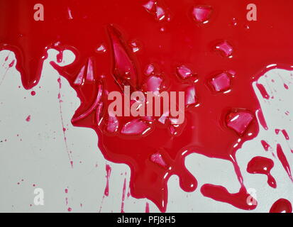 red blood splash on tile floor Stock Photo - Alamy