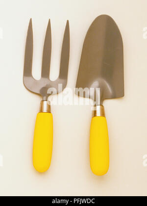 Two Forks on Yellow Background Stock Photo - Alamy
