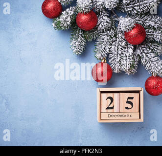 Blue wooden Christmas background with fir branches, cones, cinnamon ...