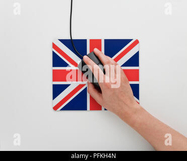 Computer mouse on Union Jack mouse pad Stock Photo - Alamy