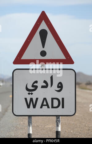 Wadi Warning Road sign, United Arab Emirates Stock Photo - Alamy