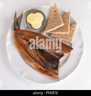 Kippers with butter, scottish smoked herring Stock Photo - Alamy