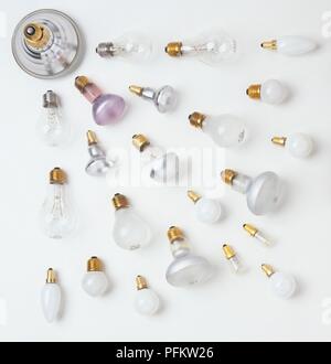 Different light bulbs on white background Stock Photo - Alamy