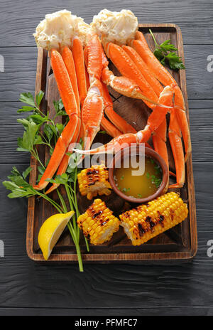 Cooked crab on wooden board/ Seafood boiled red stone crab with spices ...