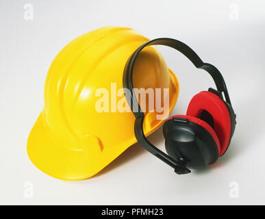 Protective red ear defenders on white background Stock Photo - Alamy
