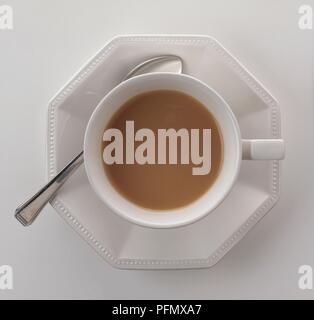 ceramic cup and spoon Stock Photo - Alamy