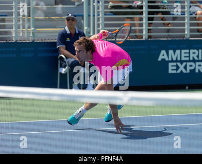 Ernest Gulbis of Latvia returns ball during qualifying day 1 against ...