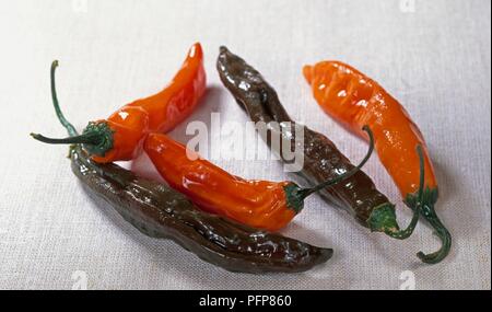 five red chilli peppers Stock Photo - Alamy
