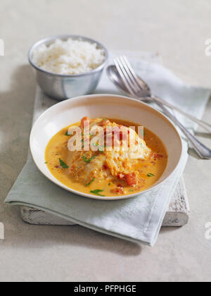 bowl of red rice on grey place mat Stock Photo - Alamy