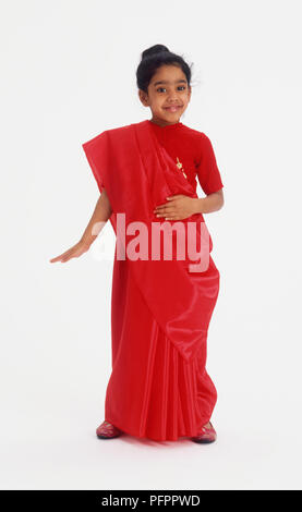 Girl full length view in sportswear exercising with pole Stock Photo ...