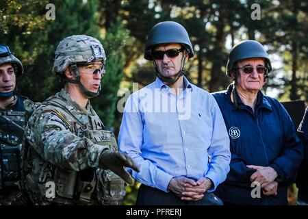 Lt. Col. Adam Lackey (middle), outgoing commander for Battle Group ...