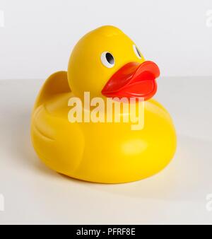 Yellow rubber duck on white background Stock Photo - Alamy