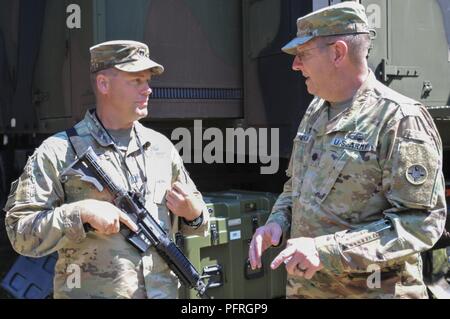 U.S. Army Lt. Col. Terry Love, of Soperton, Ga., shows the members of ...