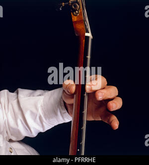 Strings on a black guitar close up, macro photo Stock Photo - Alamy