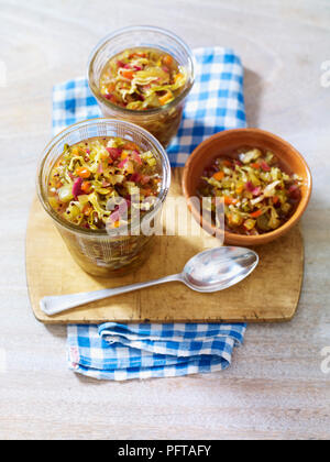 A close-up view of shredded mustard tuber pickles being air-dried ...
