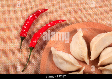 Chinese dumplings for dinner. Traditional Chinese cuisine Stock Photo ...