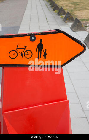 Orange Pedestrian and Cycling Sign Stock Photo - Alamy