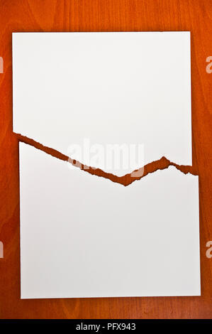 White Ripped Paper in Half on Wood Background. White torn paper 2 part ...