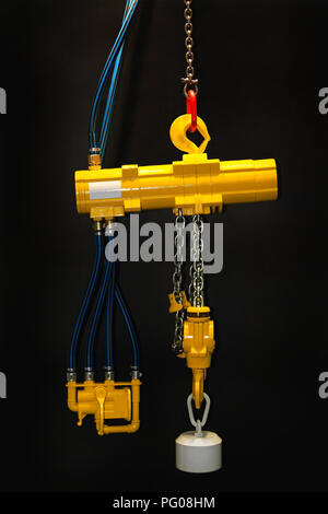 Pneumatic powered air hoist overhead crane Stock Photo - Alamy