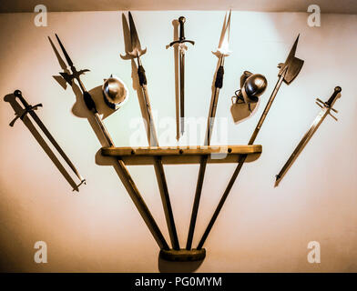 Medieval weapons on a wall Stock Photo - Alamy