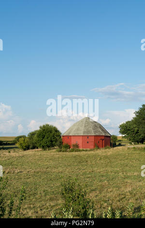 Unique round red barn surrounded by open farmland in rural illinois ...